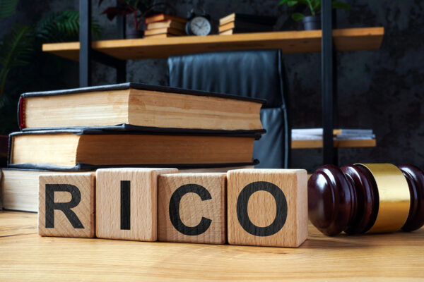 What is Racketeering? Meaning, Examples, RICO & Charges